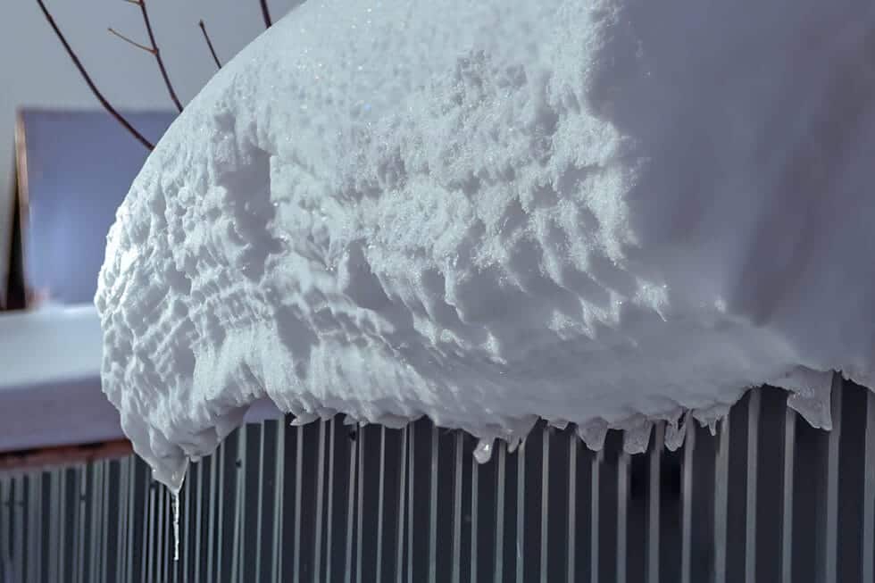 The Impact of Snow and Ice on Your Roof | Allweather Roof